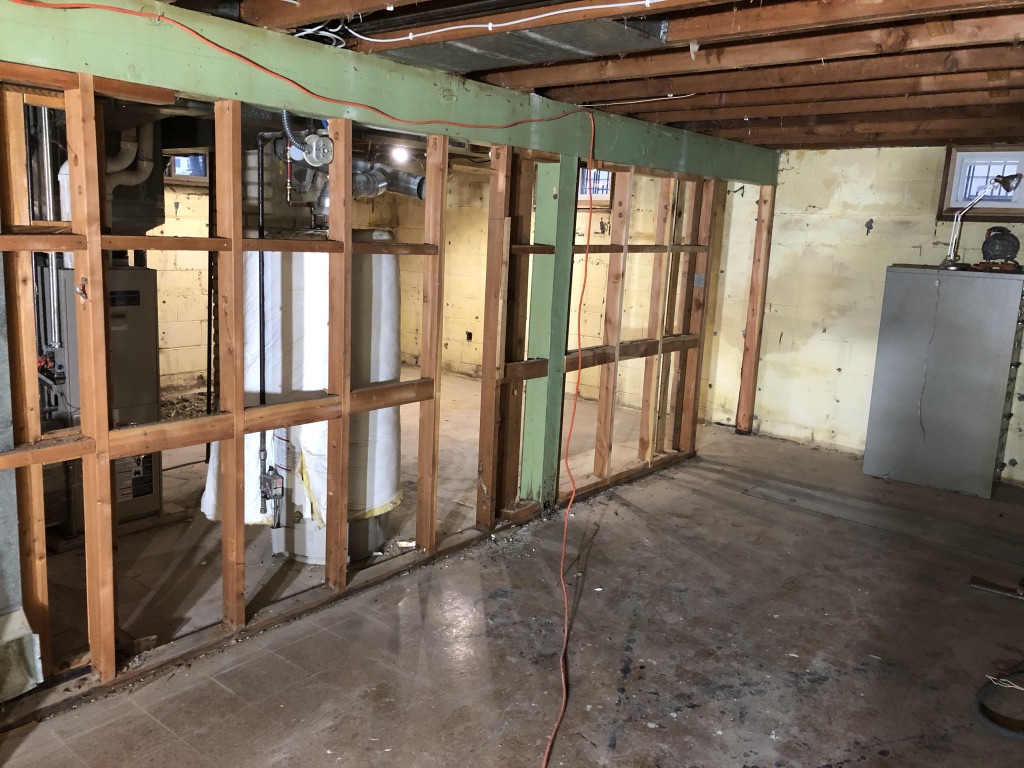 Our 1950's Basement Remodel Reveal: From Wood-Paneled to White and ...