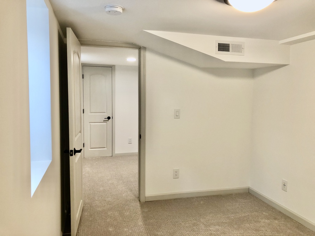 Our 1950's Basement Remodel Reveal: From Wood-Paneled to White and ...