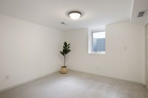 Our 1950's Basement Remodel Reveal: From Wood-Paneled to White and ...