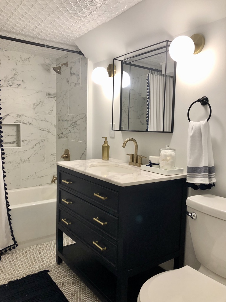 Our 1950's Basement Remodel Reveal: From Wood-Paneled to White and ...